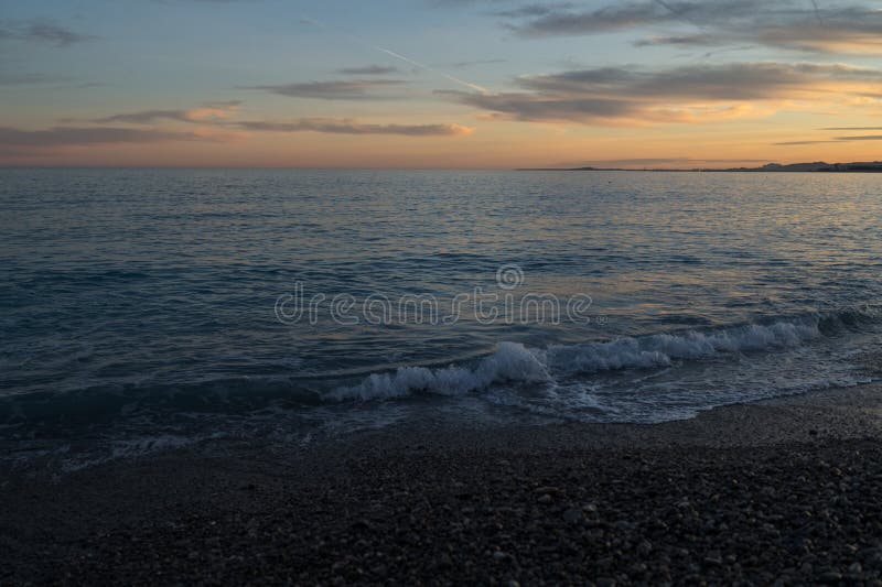 Sunset on the French Riviera Pebble Beach in Nice Stock Photo - Image ...