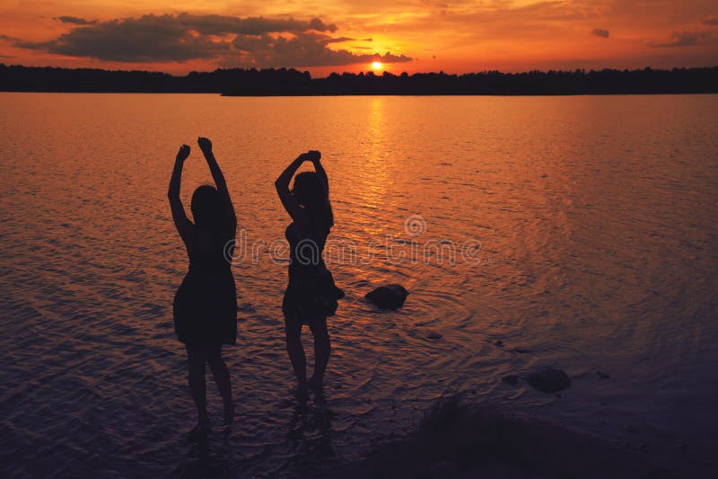 Sunset friends stock photo. Image of young, dancing, outdoors - 45120012