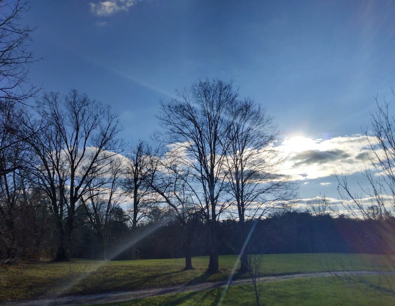 Sunset Full of Sunshine and Rays Stock Photo - Image of grass, sunshine ...