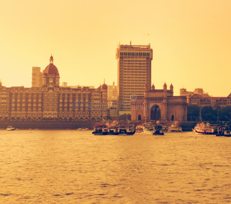 Sunset at Gate Way of India with Taj Mahal Stock Photo - Image of ...