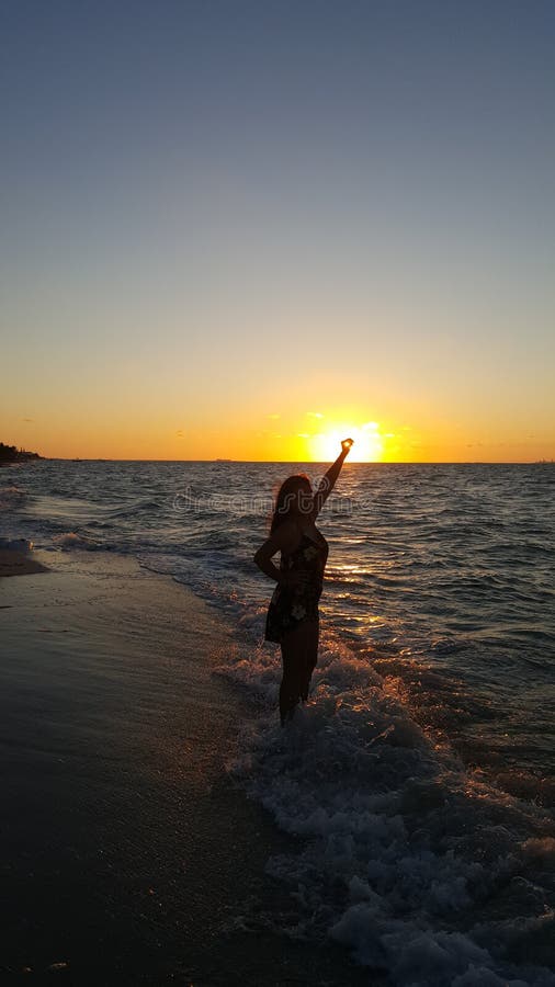 Sunset girl editorial photography. Image of waves, playa - 93106287