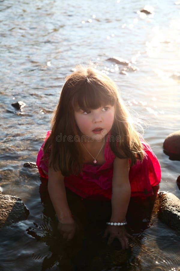 Sunset girl stock image. Image of rocks, pearls, person - 46476377