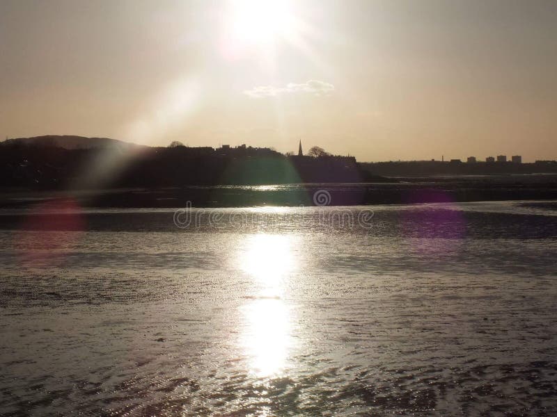 Sunset glisten stock photo. Image of musselburgh, glisten - 70862450