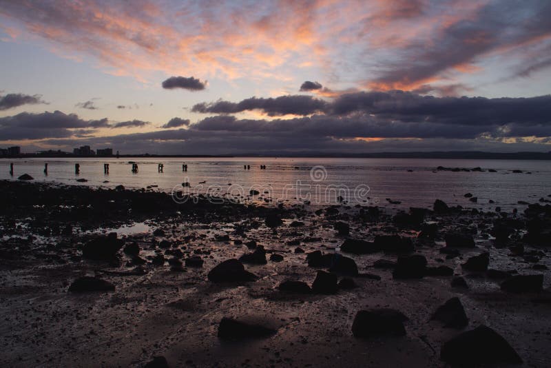 Sunset Goes Down Over a Jetty Stock Image - Image of pink, foreground ...