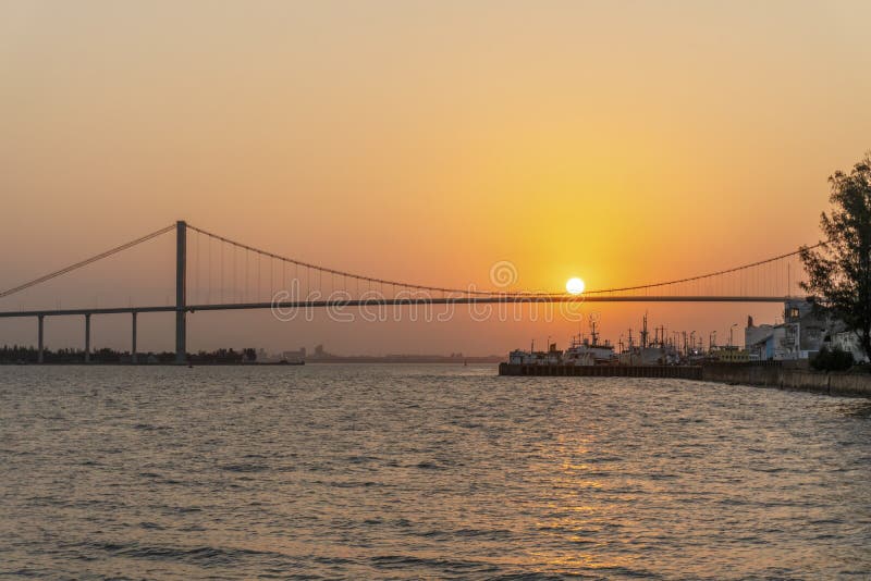 Sunset with the Golden Bridge in Maputo, Mozambique Stock Photo - Image ...