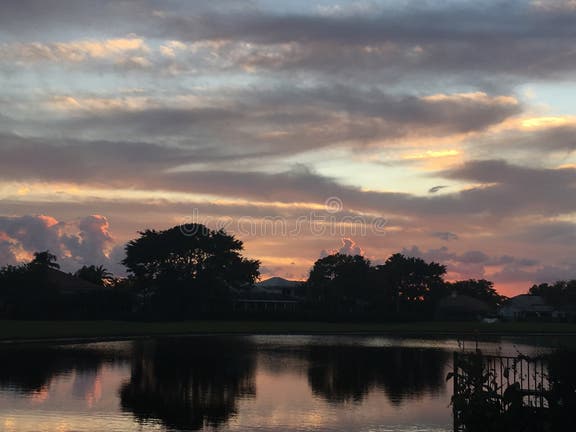 Sunset on the golf course stock photo. Image of pink - 85836744