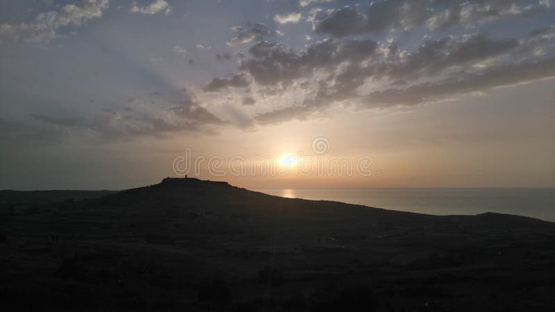 Sunset in Gozo, Malta stock image. Image of malta, coastline - 95915359
