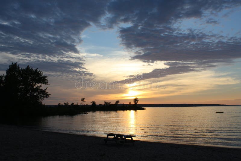 Sunset on Grandview Beach stock image. Image of cottage - 67712331