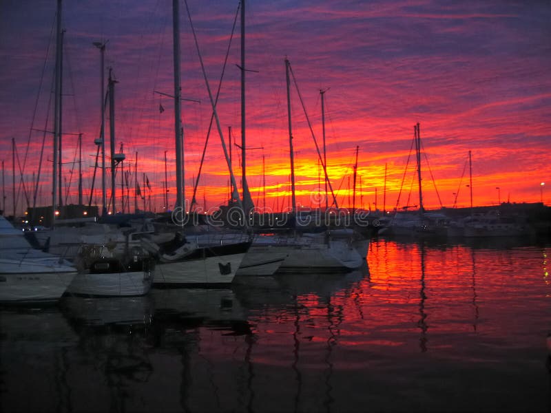 Sunset in the harbor stock image. Image of mediterranean - 504669