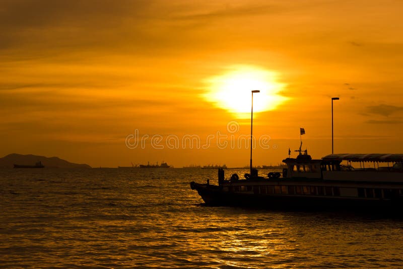 Sunset on the harbor. stock image. Image of attraction - 33326119