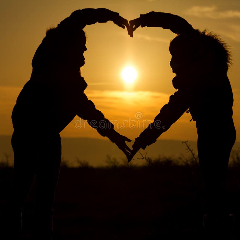 Couple Helping To Shoveling Stone for Repair the Broken Heart Shape ...