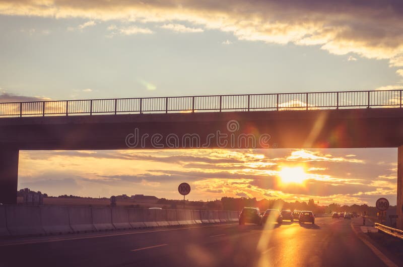 Sunset in highway stock image. Image of natural, cars - 127708841