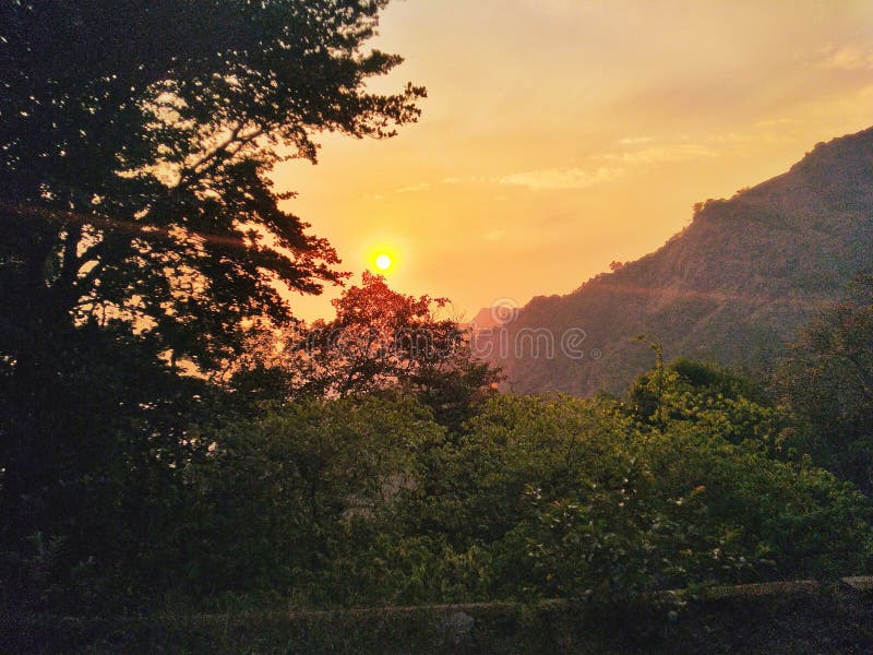 Sunset at the hill stock photo. Image of sunset, beautiful - 171942790