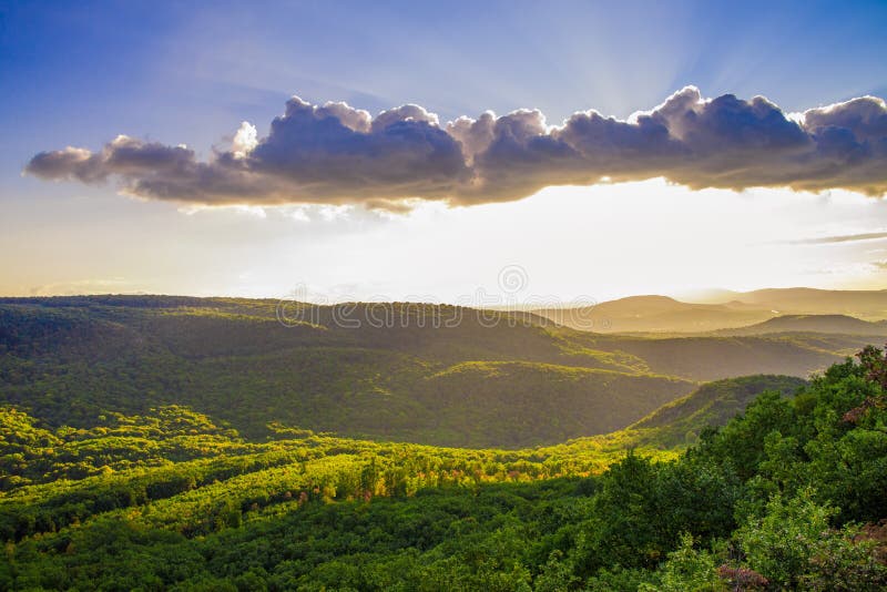 Sunset at the hillside stock photo. Image of field, sunlight - 102782104