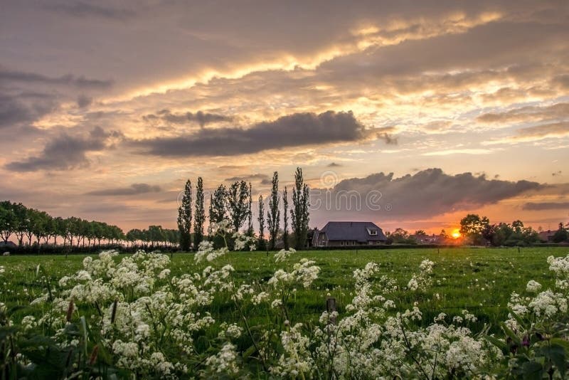 Sky and sunset in holland. stock image. Image of sunset - 138996651