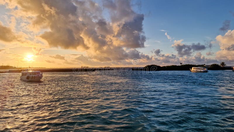 Sunset on Hulhule Island, Maldives EmagaTravels Stock Photo - Image of ...