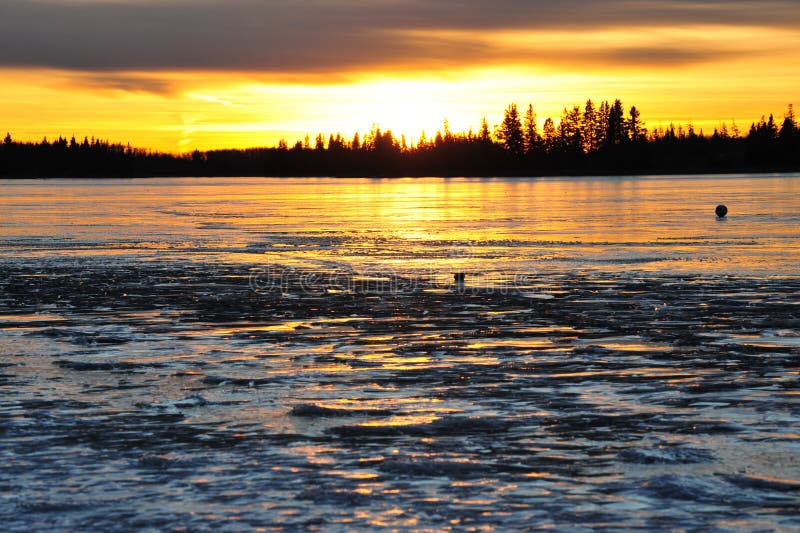 Sunset on ice lake stock image. Image of horizon, garish - 7318895