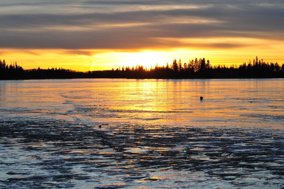 Sunset on ice lake stock photo. Image of dusk, landscape - 7320790