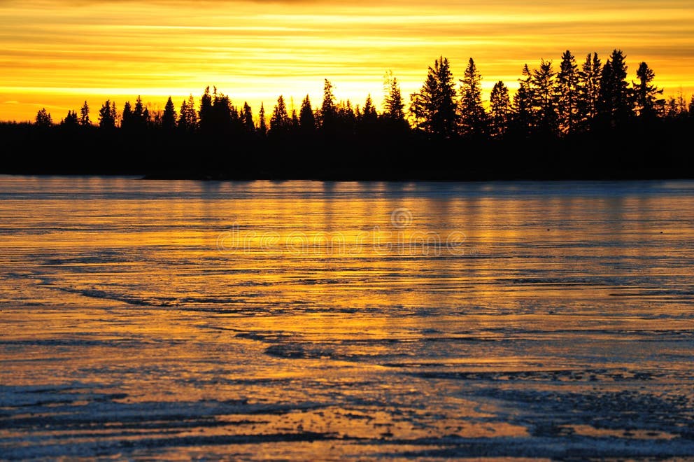 Sunset on ice lake stock image. Image of seasonal, island - 7331745