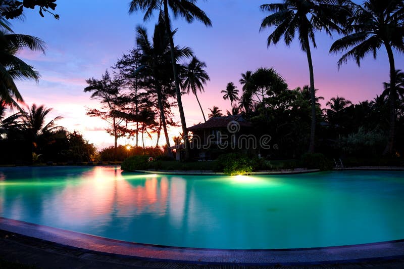 Sunset and Illuminated Swimming Pool Stock Image - Image of asia ...