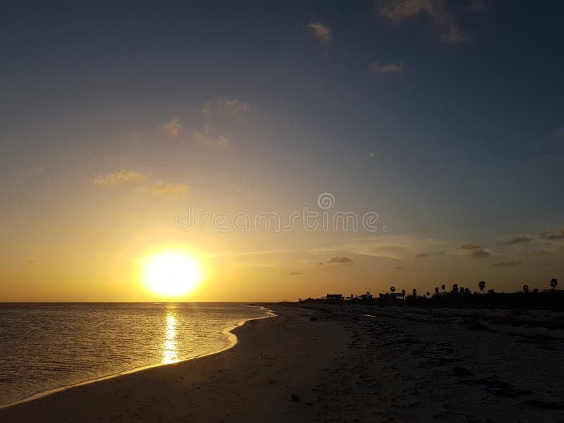 Sunset Inagua. BAHAMAS editorial photography. Image of sunset - 121813232