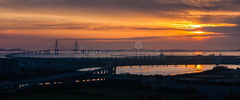 Sunset and Incheon Bridge stock photo. Image of illuminated - 45157268