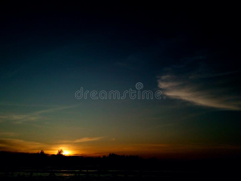 Sunset in Indonesia the Beach Stock Photo - Image of sunrise, dusk ...