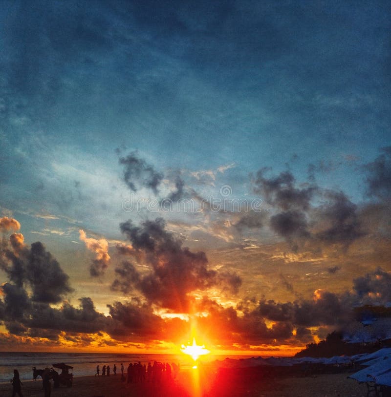 Sunset in indonesia stock image. Image of ocean, beautiful - 220229099