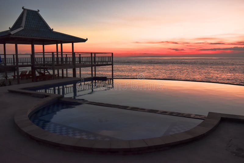 Sunset in a infinity pool. stock photo. Image of summer - 173580566