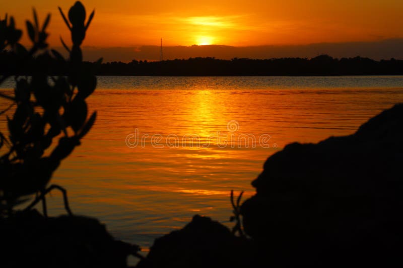 Sunset on the Inlet stock photo. Image of ocean, yellow - 272224442