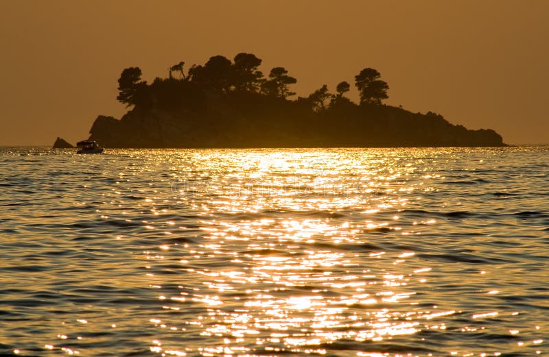 Sunset island stock photo. Image of rock, outline, sunset - 15273826