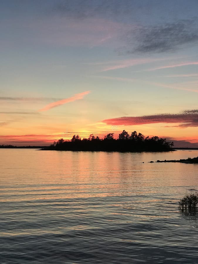 Sunset Island stock photo. Image of island, sunset, trees - 165419580