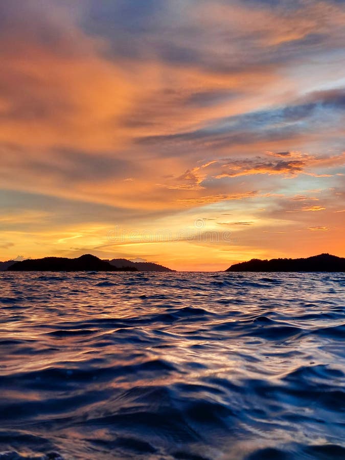 Sunset island vibes stock image. Image of cloud, shore - 259499037