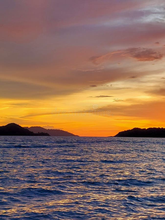 Sunset island vibes stock photo. Image of sunlight, evening - 259499040