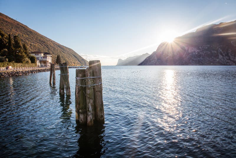 Sunset at italian lake editorial photo. Image of tourism - 82544151