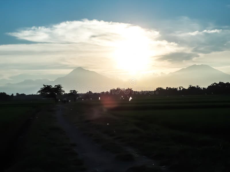Sun between Two Mountain,evening at Countryside. Stock Image - Image of ...