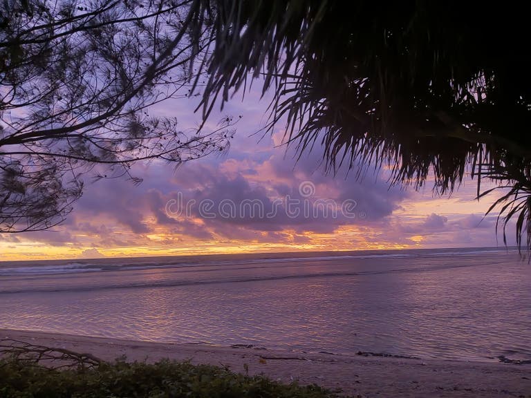 Sunset on Java beach stock photo. Image of ocean, water - 267369036