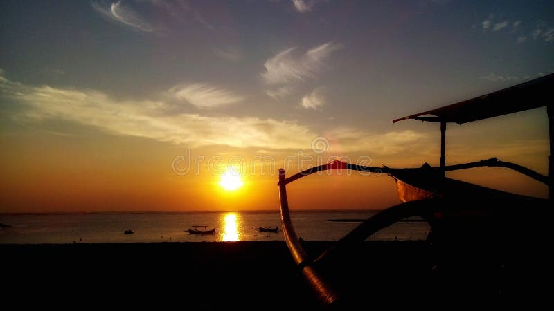 Sunset at Jerman Beach, Bali Stock Photo - Image of sunlight, dawn ...