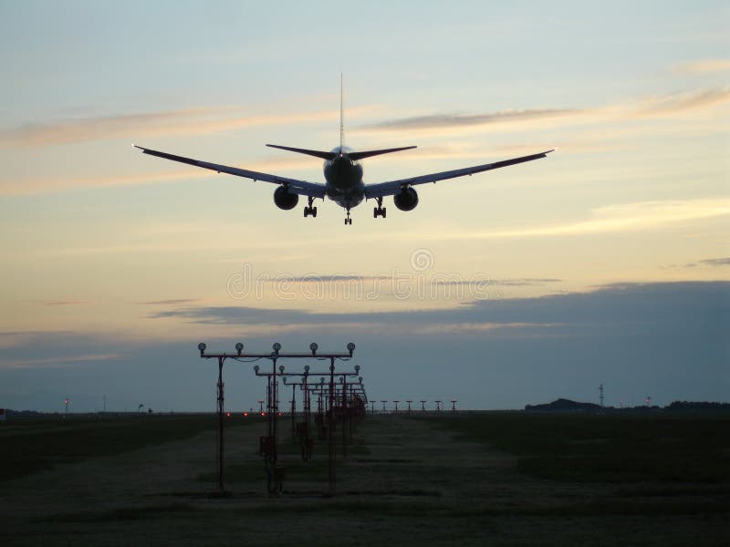 Sunset Jet Landing stock image. Image of dusk, airline - 10415073