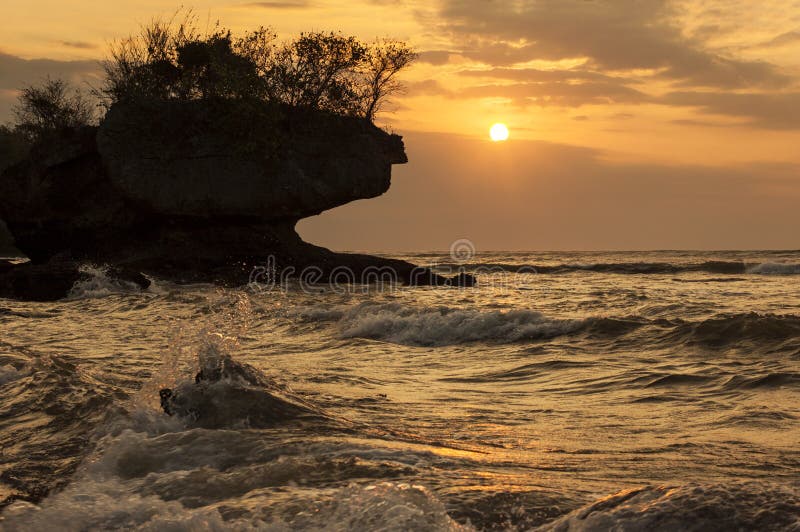 Sunset in jimbaran beach stock photo. Image of beach - 55570210
