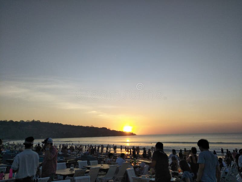 Sunset on jimbaran beach editorial image. Image of nice - 278094085