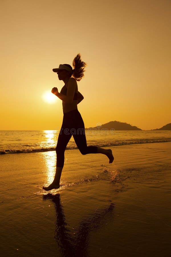 Running at Sunset stock image. Image of sand, profile - 4796393