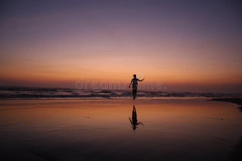 Sunset jump stock image. Image of reflection, people, water - 2476029