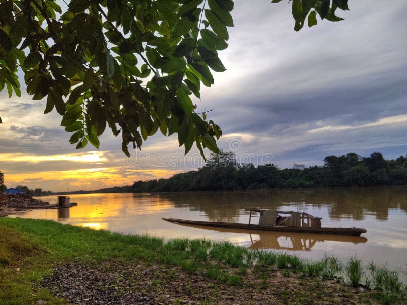Sunset at Kahayan river stock image. Image of river - 203366791