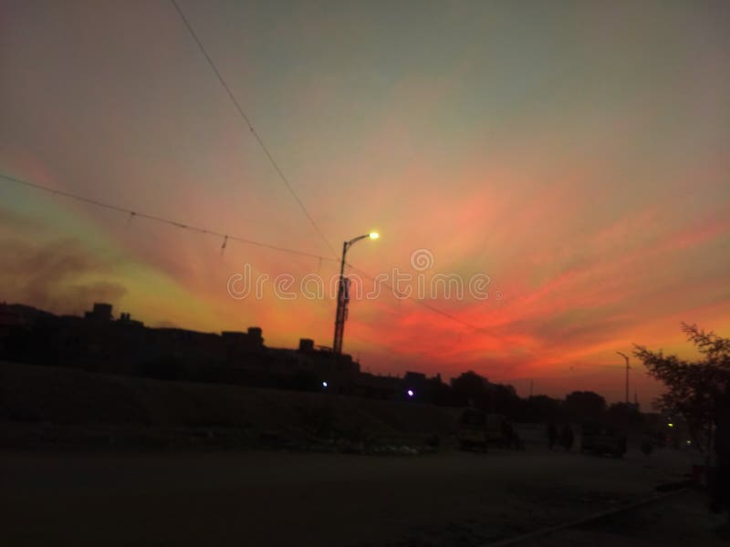 Sunset in karachi stock photo. Image of orange, afterglow - 238797966