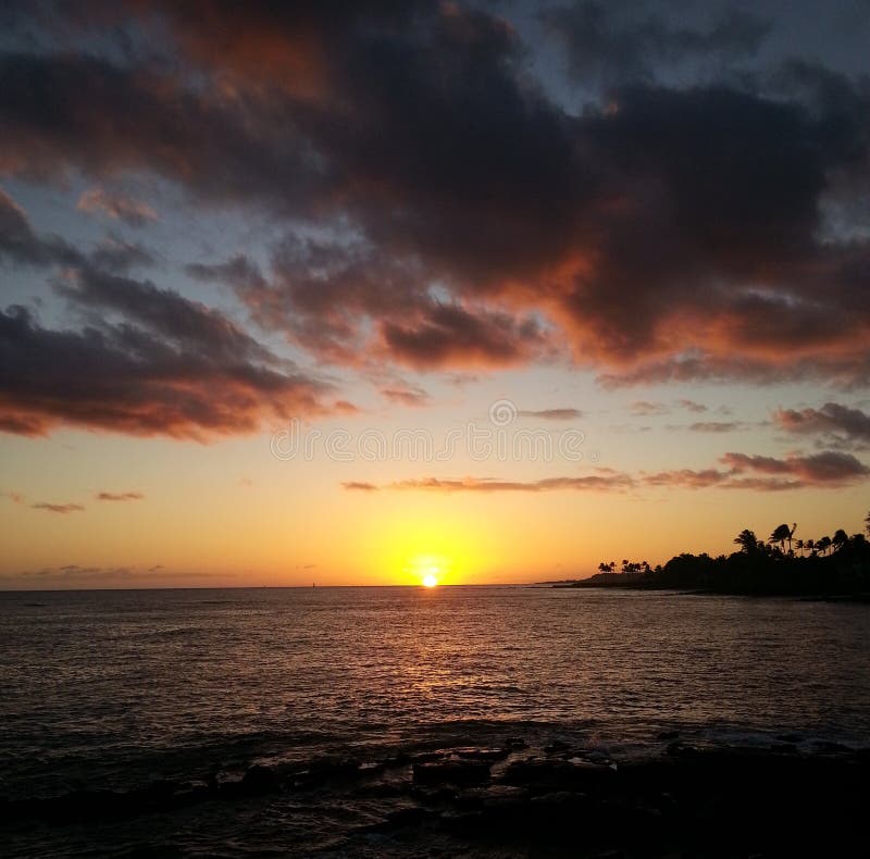 Sunset in Kauai Hawaii stock image. Image of kauai, village - 75557283