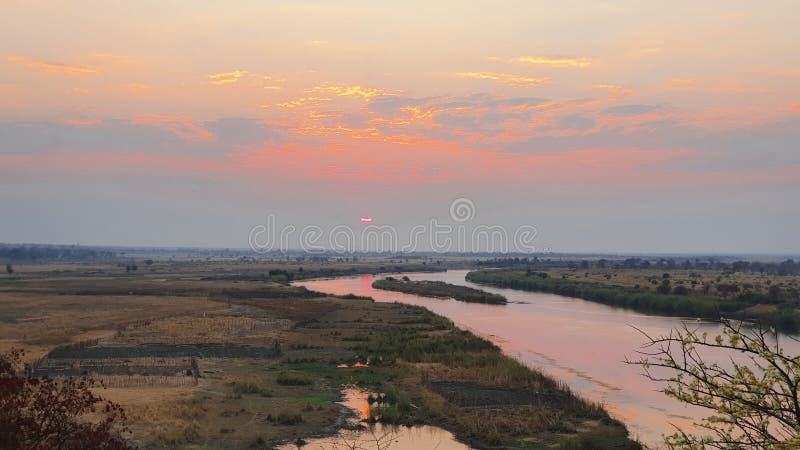 Sunset of the Kavango River Stock Photo - Image of sunrise, evening ...