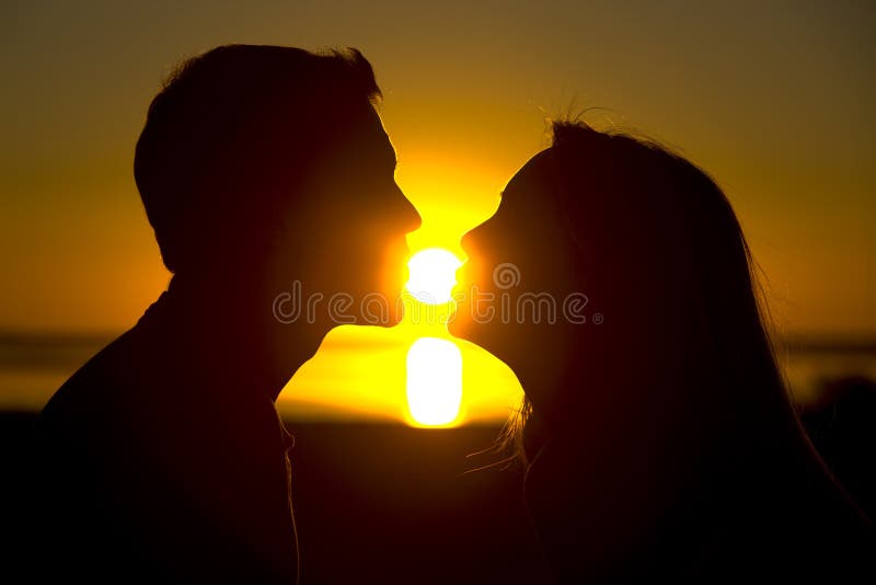 Sunset Kiss stock photo. Image of married, adults, happy - 9454102