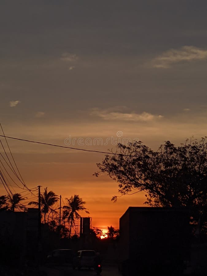 Sunset in Kupang stock photo. Image of tree, cloud, indonesia - 269731500