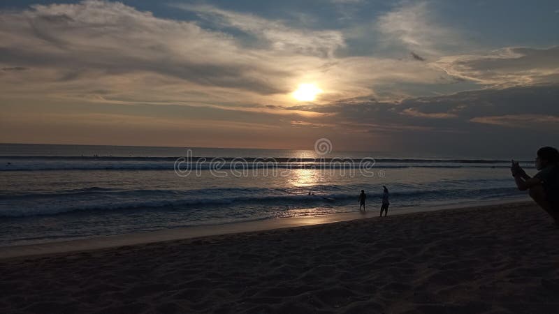 Sunset at kuta beach stock image. Image of kuta, sunset - 221092083
